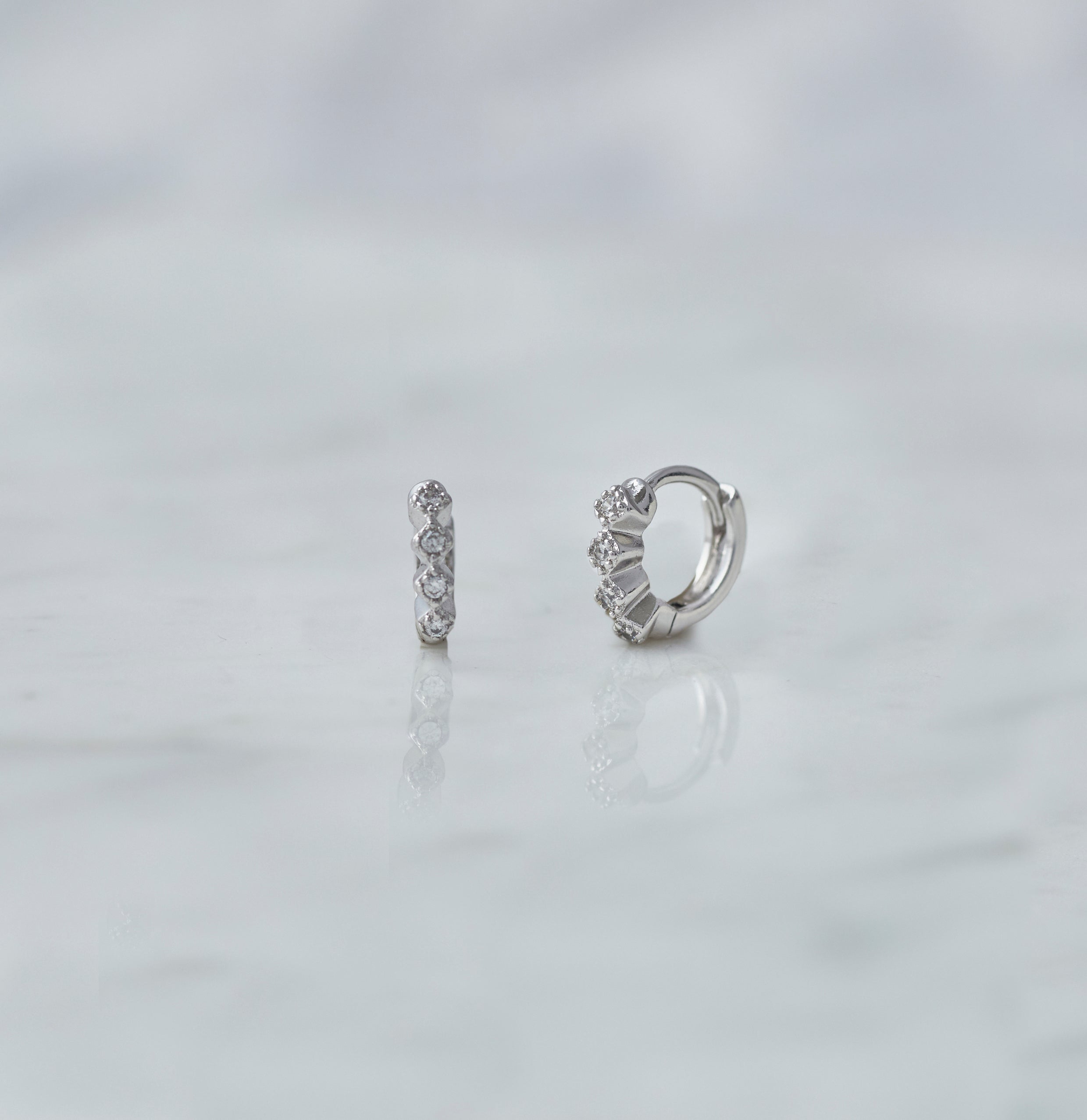 Lucy Micro Pave Huggy Hoop, Silver – Natalie B. Jewelry